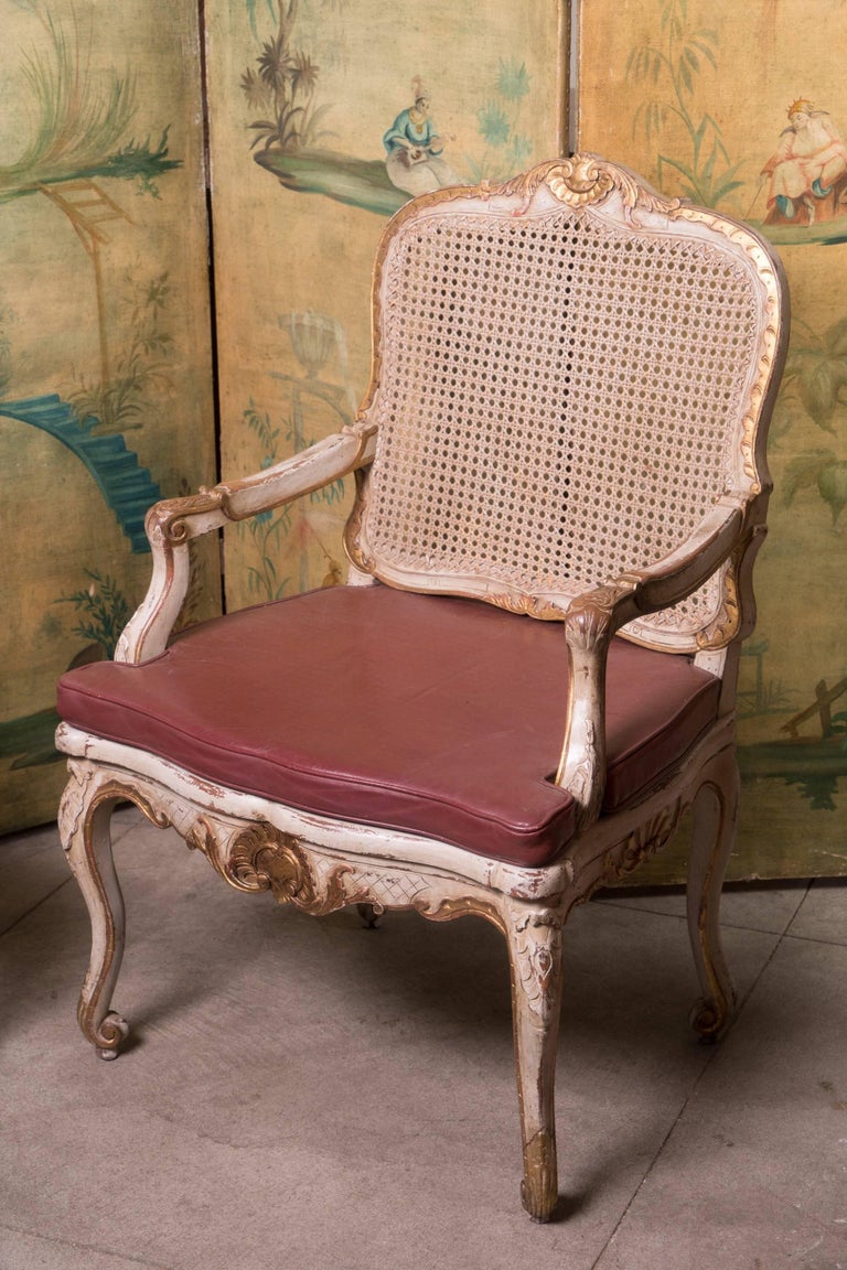 Pair of Painted and Gilded Caned Regence Chairs at 1stDibs