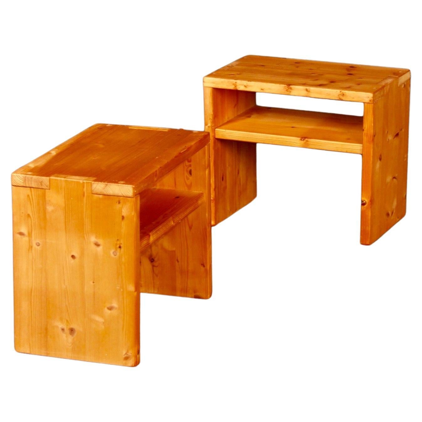 Pair of solid pine stools / side tables with cylindrical foot rail c ...