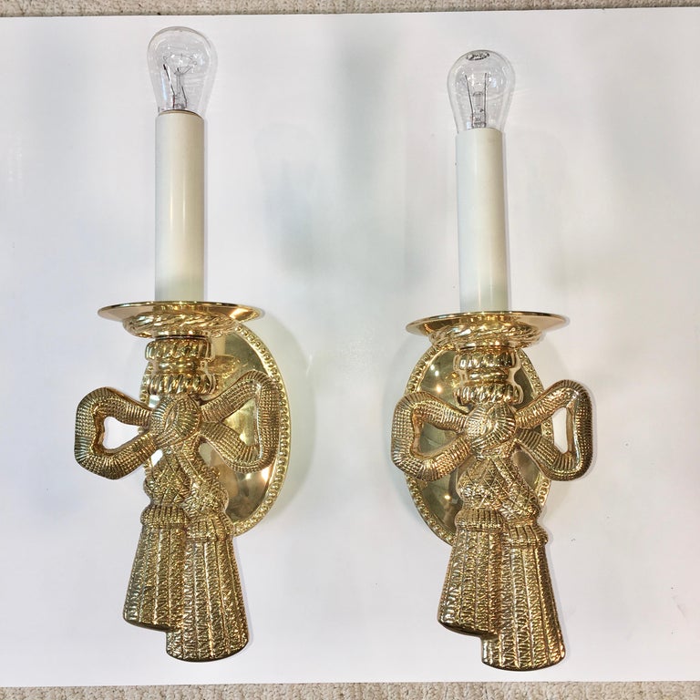 Pair of Polished Brass Bow Sconces For Sale at 1stDibs