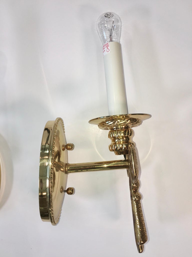 Pair of Polished Brass Bow Sconces For Sale at 1stDibs