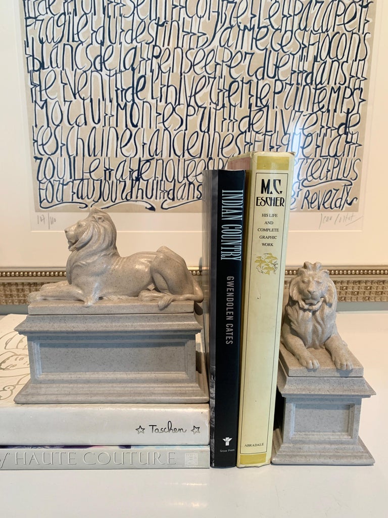 Pair of Reclining Lion Bookends For Sale at 1stDibs
