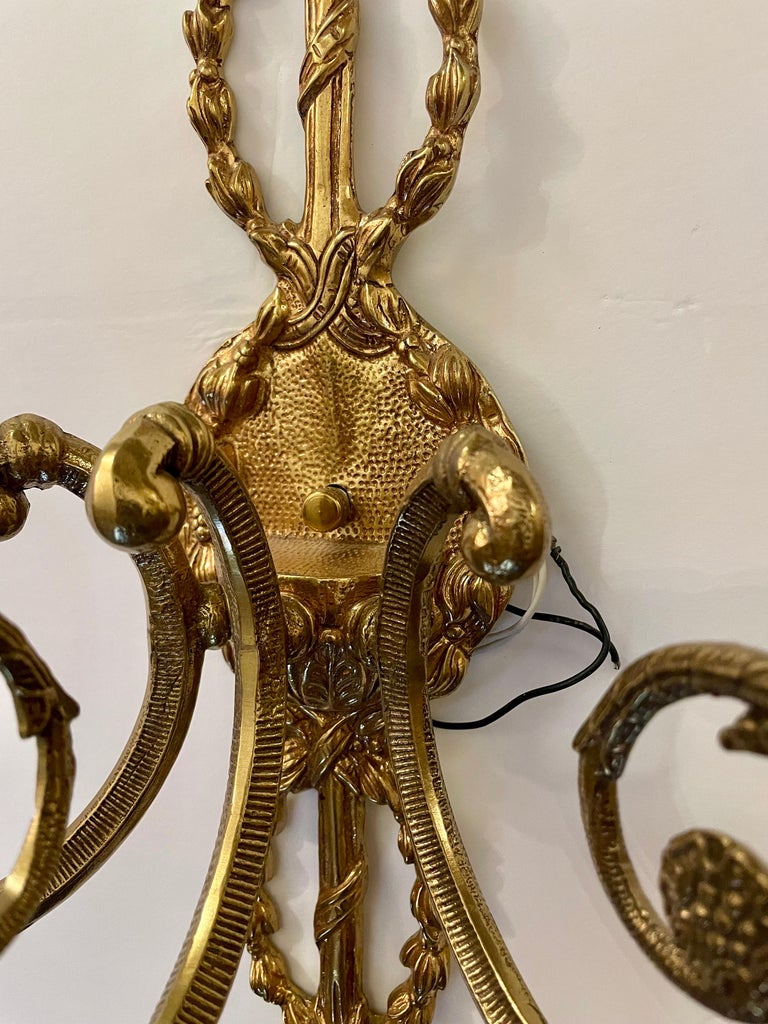 Pair of Regency Style Three Arm Brass Sconces For Sale at 1stDibs