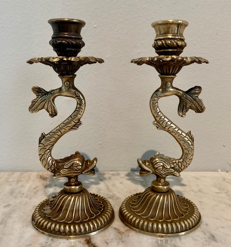 Pair of Repoussé Brass Dolphin Candlesticks For Sale at 1stDibs