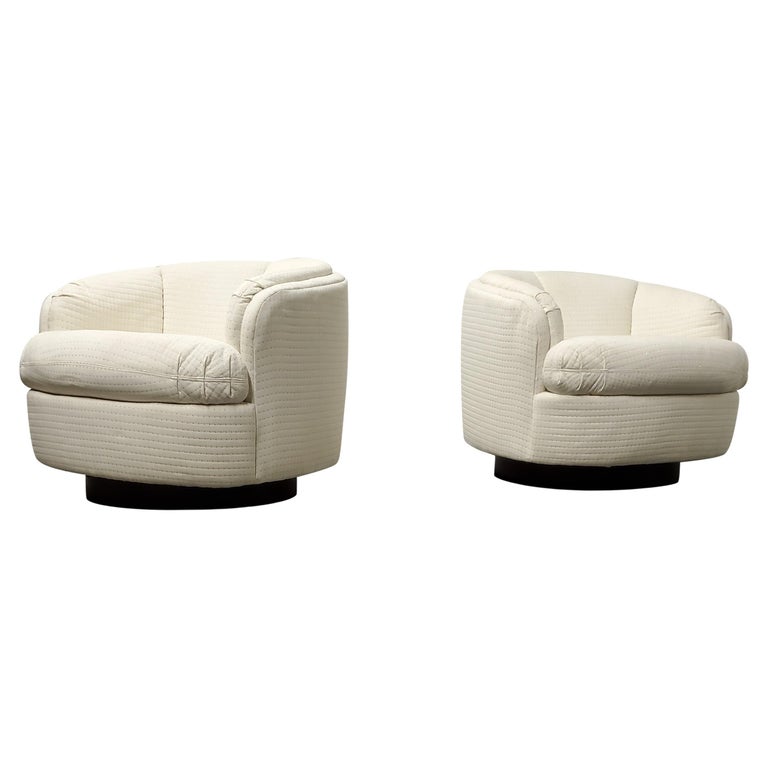 Pair of Rounded Swivel Lounge Chairs by Selig For Sale at 1stDibs