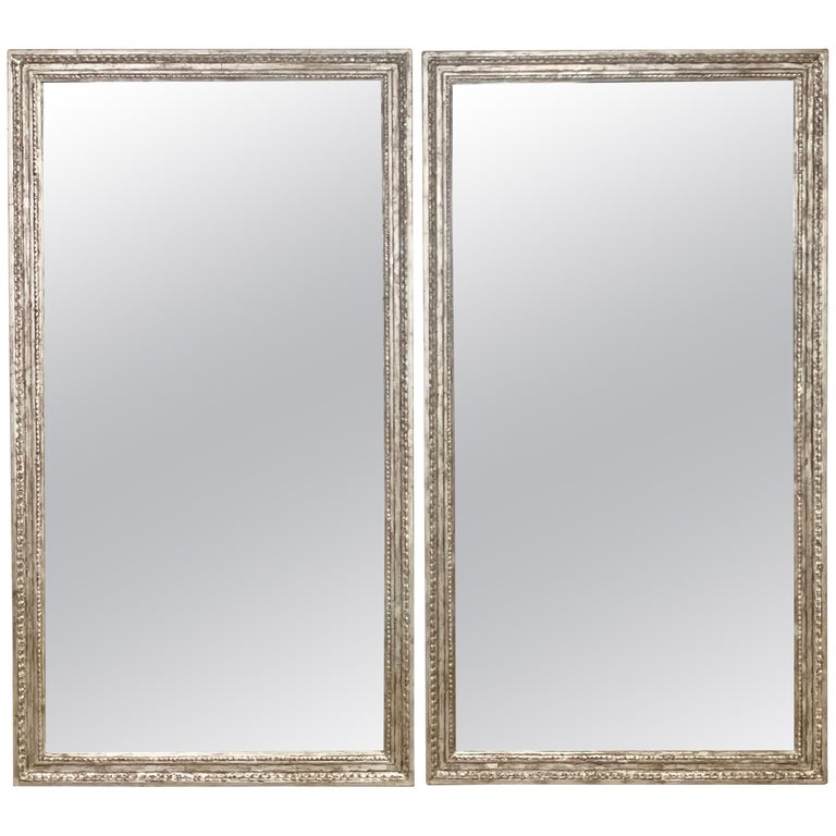 Pair of Silvered Hand Carved Mirrors by MLA at 1stDibs