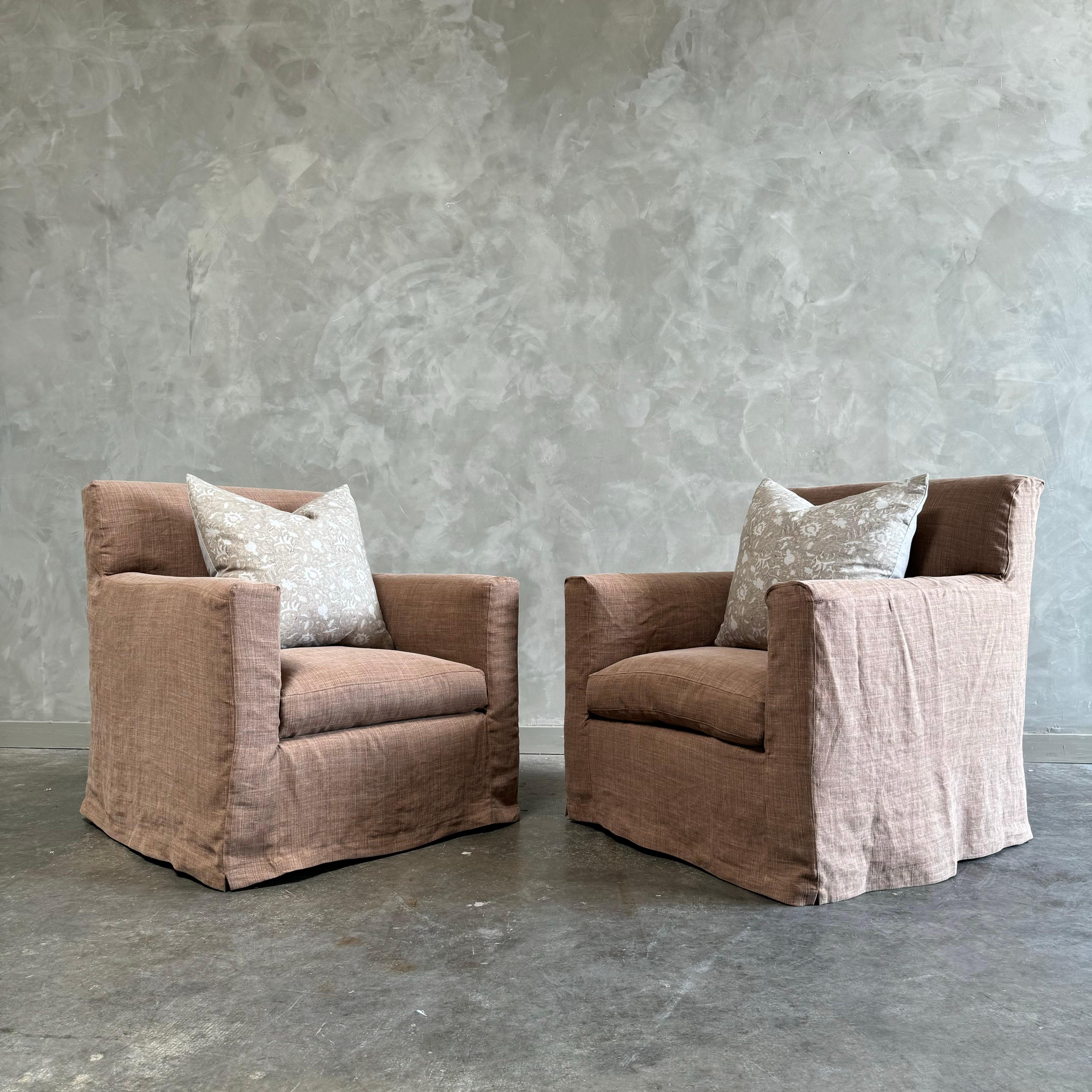 Pair of Slip Covered Linen Swivel Chairs at 1stDibs