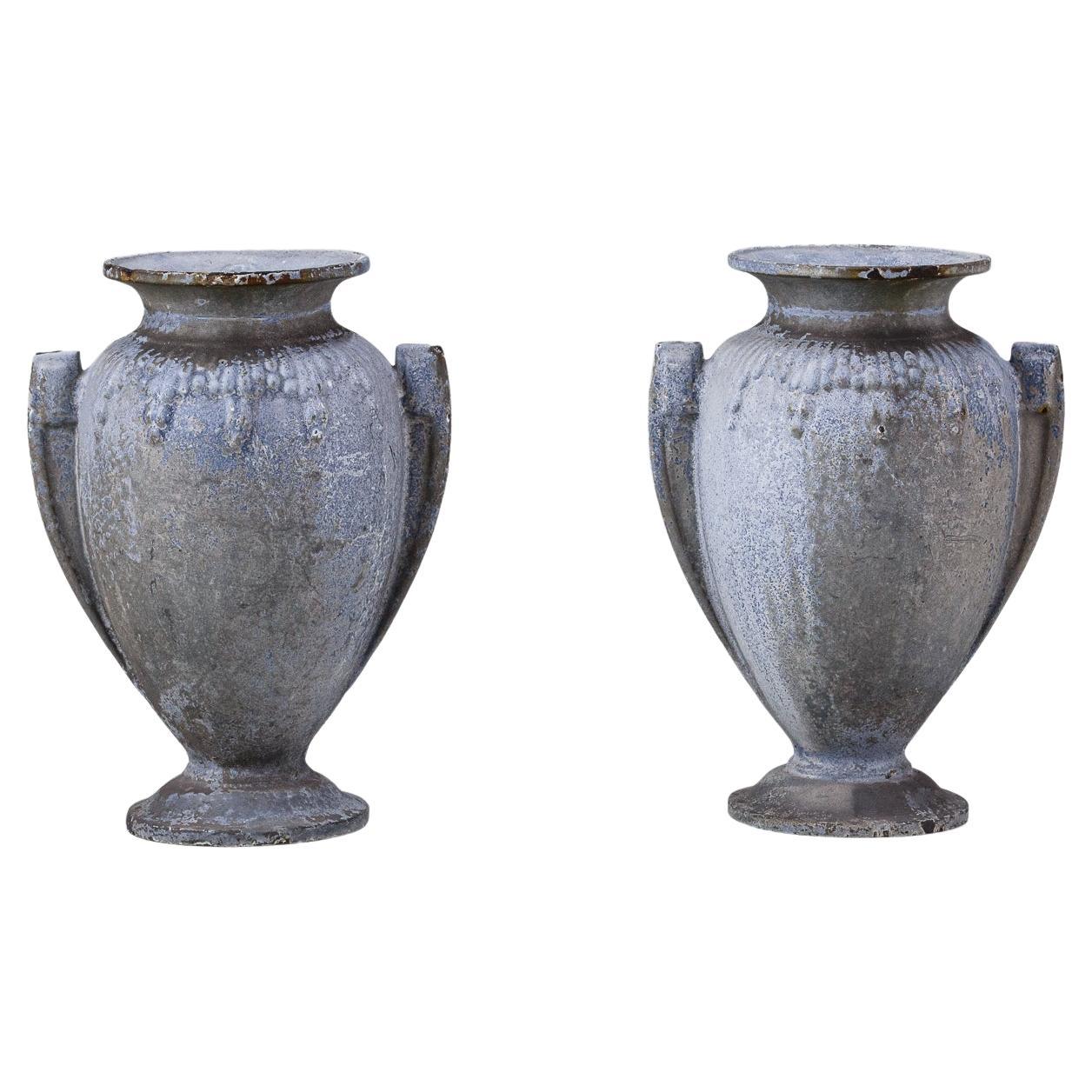 Pair of Early 20th Century Cast Stone Pedestal Urns at 1stDibs
