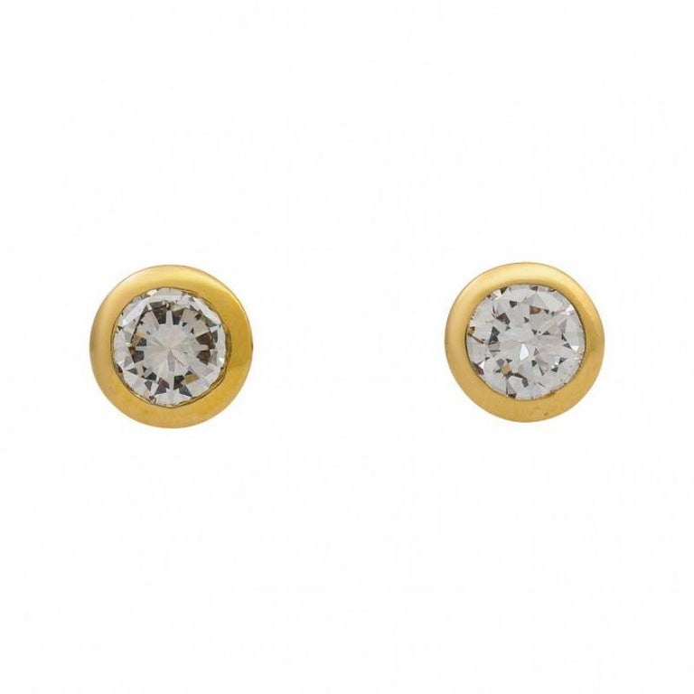 Pair of Solitaire Stud Earrings with 2 Diamonds For Sale at 1stDibs