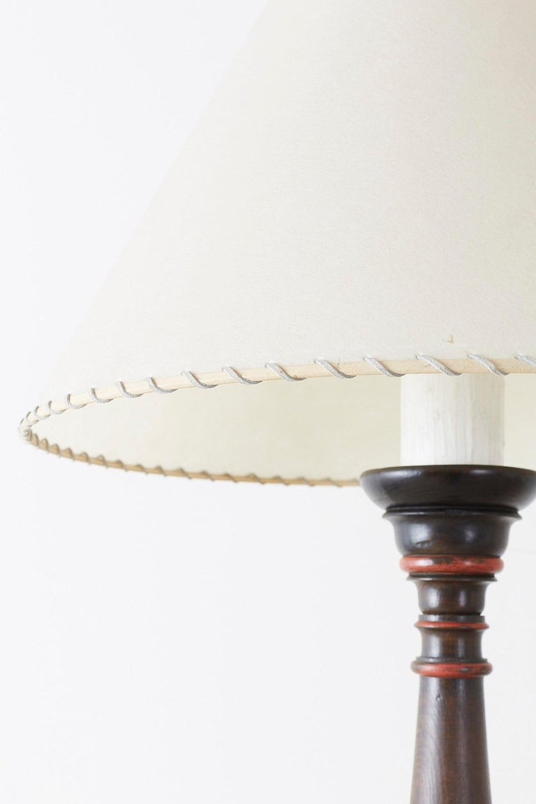 Pair of Spanish Colonial Style Wooden Candlestick Floor Lamps at 1stDibs