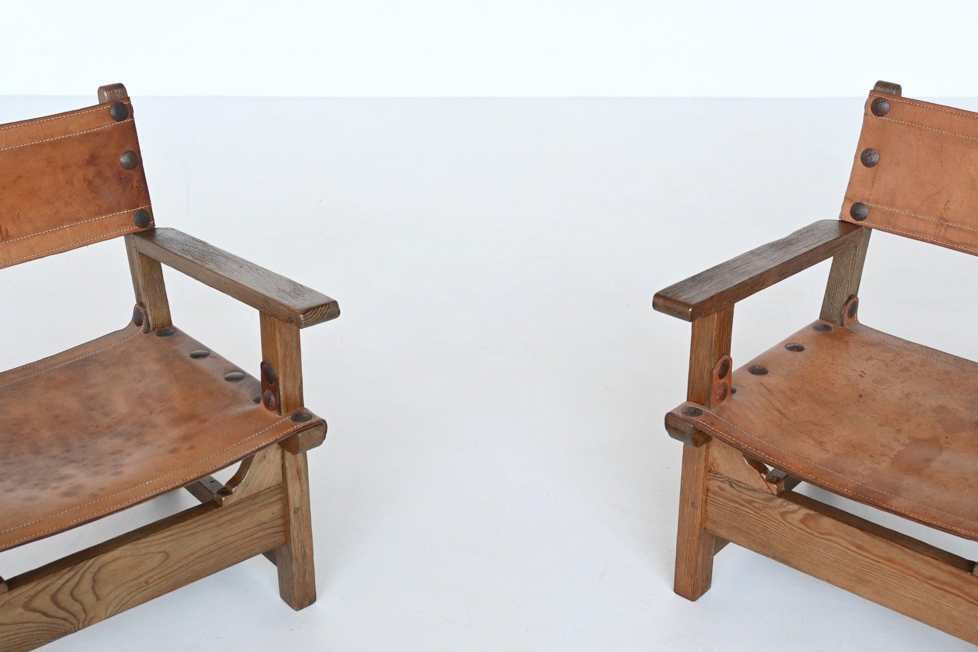 Pair of Spanish lounge chairs oak and saddle leather Spain 1960 For ...