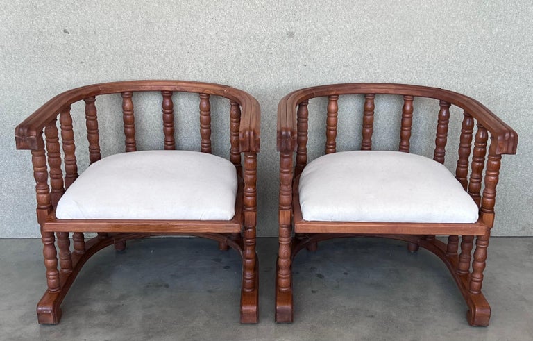 Pair of Spanish Slatted Barrel Back Hand Carved Chairs For Sale at 1stDibs