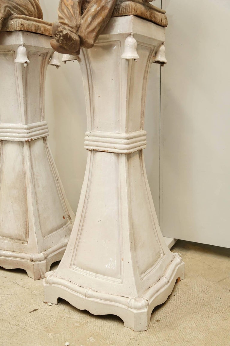 Pair of Terracotta Chinoiserie Figures on Ceramic Columns at 1stDibs
