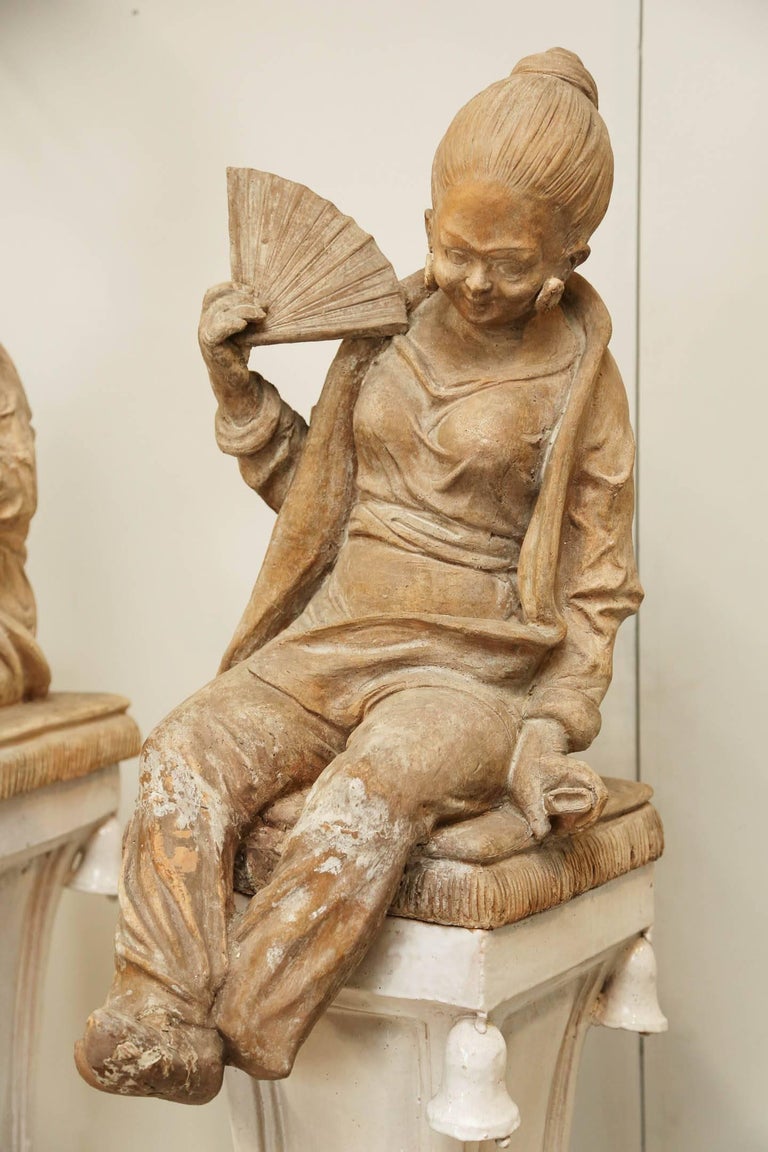 Pair of Terracotta Chinoiserie Figures on Ceramic Columns at 1stDibs