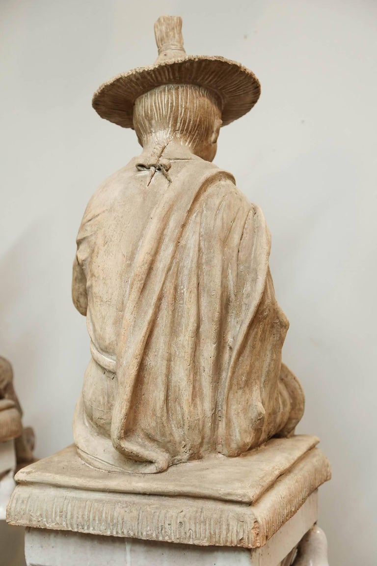 Pair of Terracotta Chinoiserie Figures on Ceramic Columns at 1stDibs