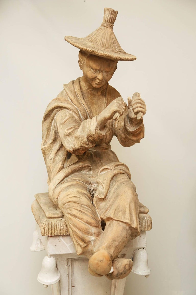 Pair of Terracotta Chinoiserie Figures on Ceramic Columns at 1stDibs