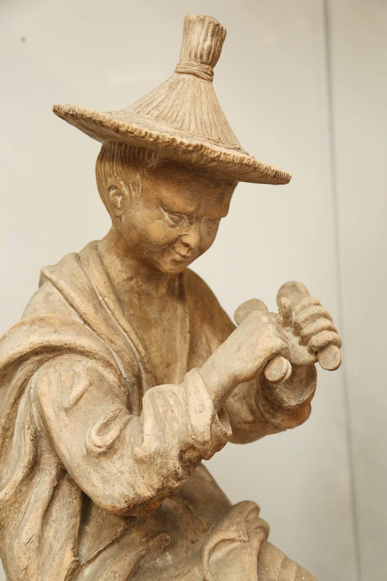 Pair of Terracotta Chinoiserie Figures on Ceramic Columns at 1stDibs