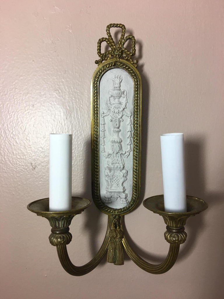 Pair of Two-Light Brass Ribbon Top Sconces with Painted Back, 20th ...