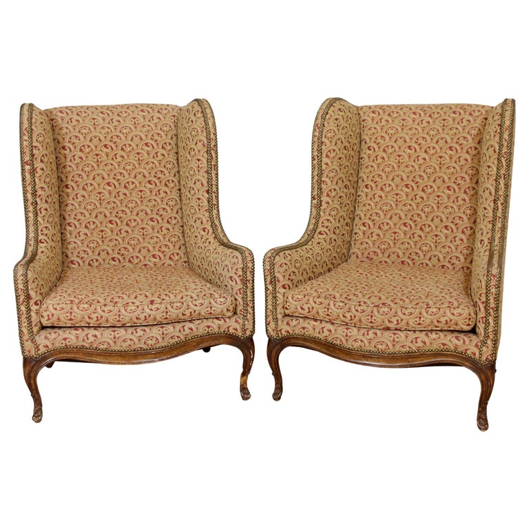 Pair of Upholstered Tan Wing Back Chairs w/ Ornate Figural Details For ...