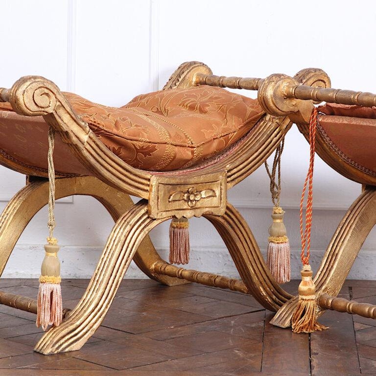 Pair of Vintage Carved Gilt X-Frame Stools For Sale at 1stDibs
