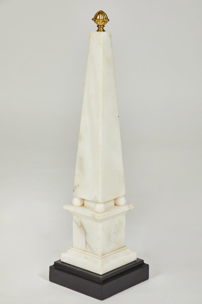 Pair of White Marble Obelisks on Painted Wood Bases with Brass Acorn ...