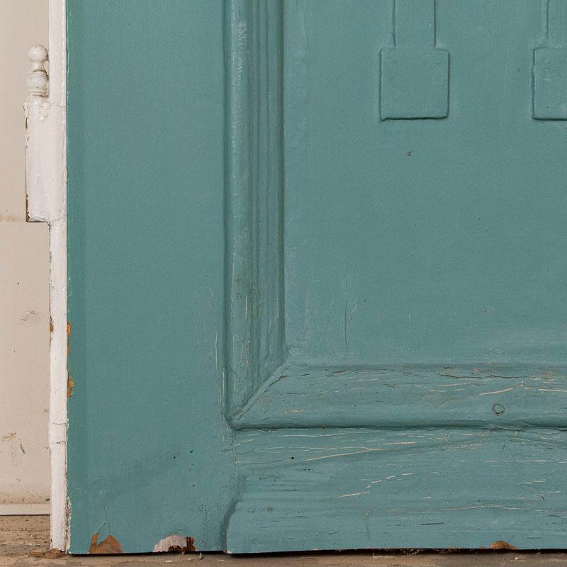 Original Blue Painted Doors with Decorative Iron Flowers and Scroll ...