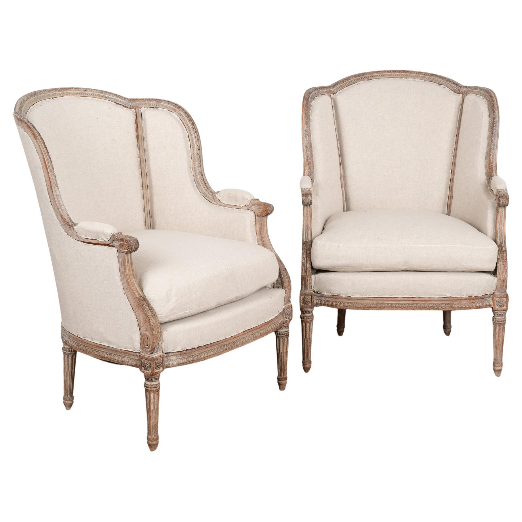 Matching pair of Victorian Carved Oak Wing Arm Chairs For Sale at 1stDibs