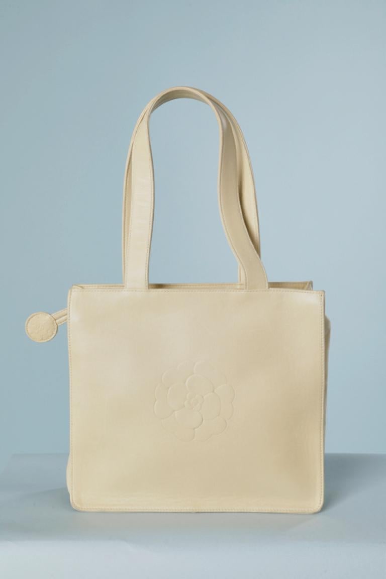 Pale yellow leather hand bag with embossed "Double C" and Camelia ...