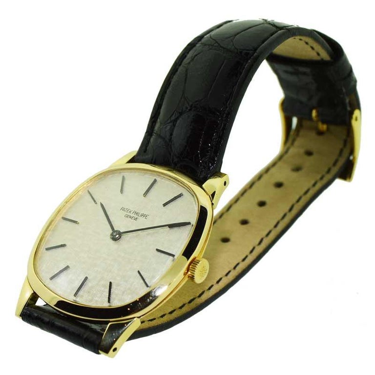 Patek Philippe 18 Karat Yellow Gold Cushion Shaped Watch, circa 1960s ...