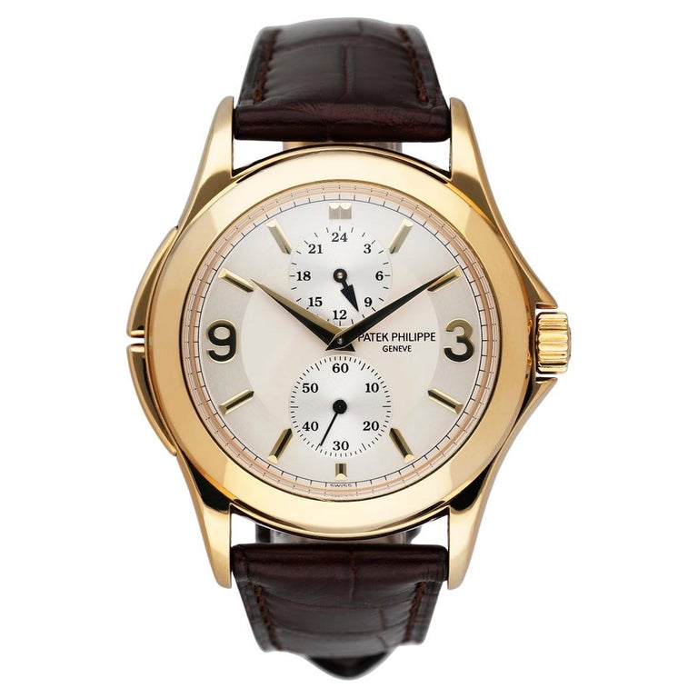 Patek Philippe Calatrava Travel Time 5134J 18K Yellow Gold Mens Watch ...