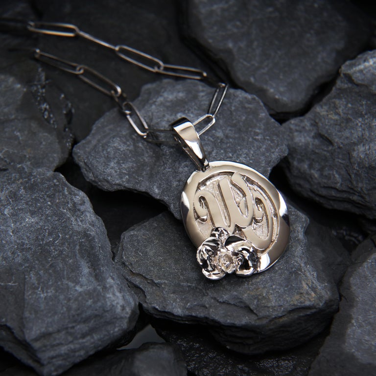Pendant, White Gold Logo Charm Embossed with a Moth Orchid ...