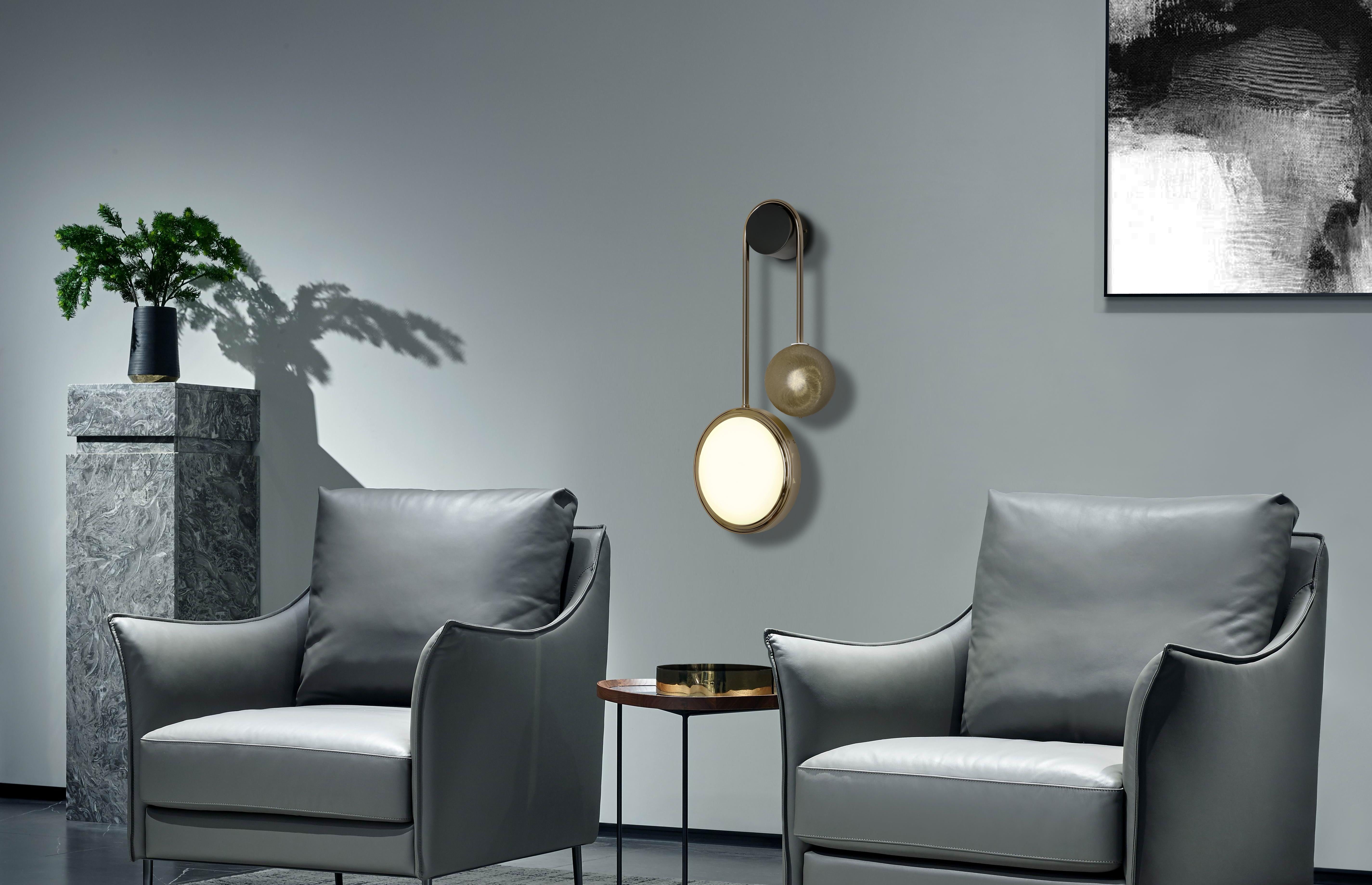 Pendulum Inspired Brass and Glass Gold Color Finish Wall Lamp at 1stDibs