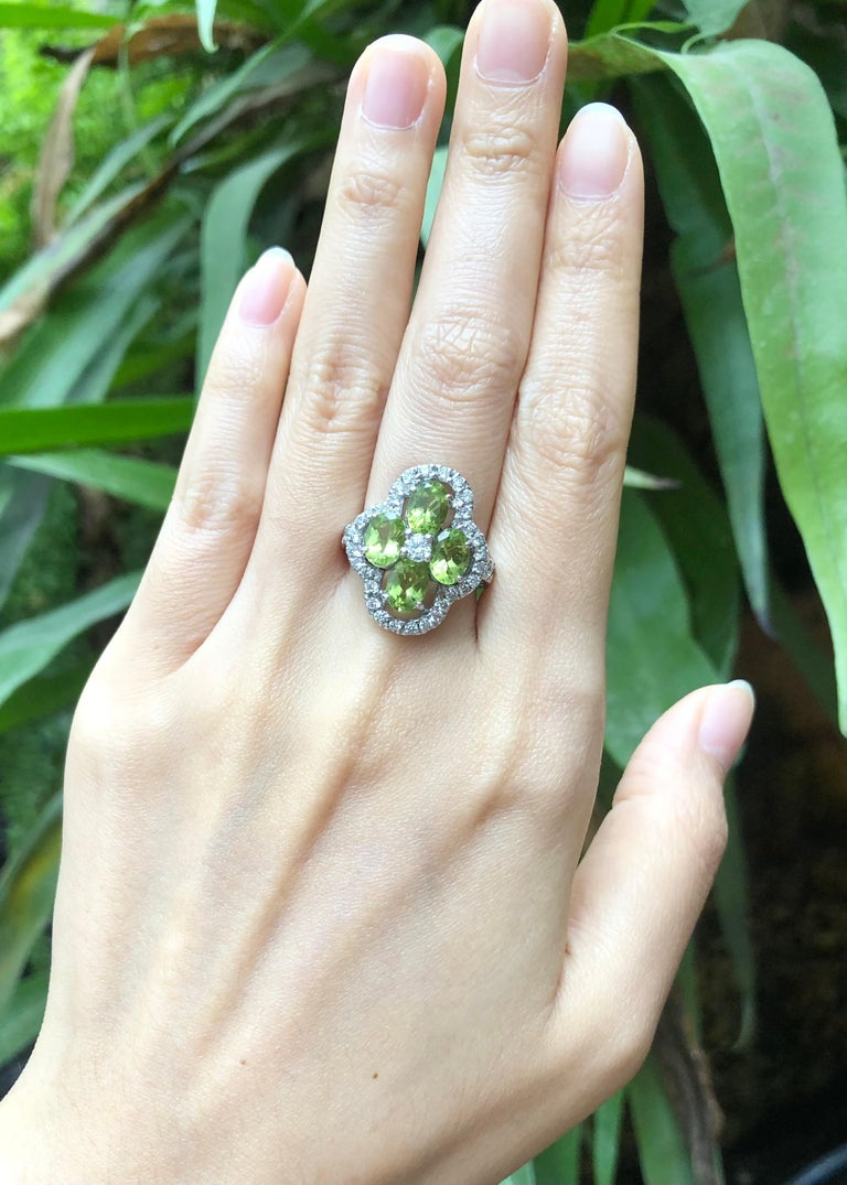 Peridot with Cubic Zirconia Ring set in Silver Settings For Sale at 1stDibs