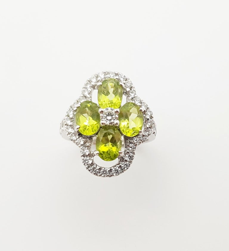 Peridot with Cubic Zirconia Ring set in Silver Settings For Sale at 1stDibs