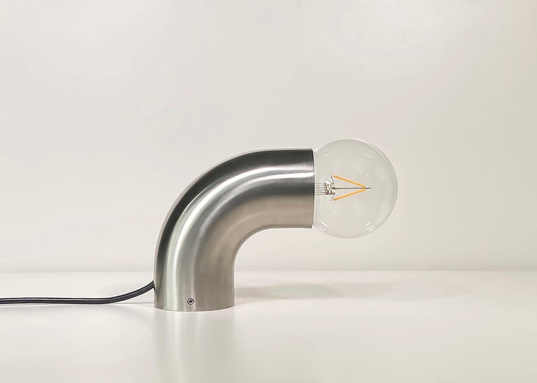 Perry Brushed Stainless Steel Table Lamp Clear Bulb For Sale at 1stDibs