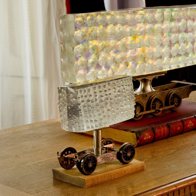 Phateon, a steel and glass train / locomotive inspired sculpture by Jon ...