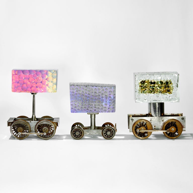 Phateon, a steel and glass train / locomotive inspired sculpture by Jon ...