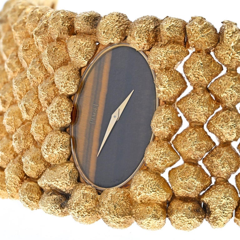 Piaget 18K Yellow Gold 1970's Nugget Oval Tiger Eye Dial Watch For Sale ...
