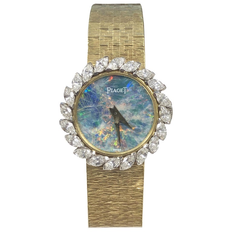 Piaget Ladies Gold Diamond and Opal Dial Mechanical Wristwatch at 1stDibs