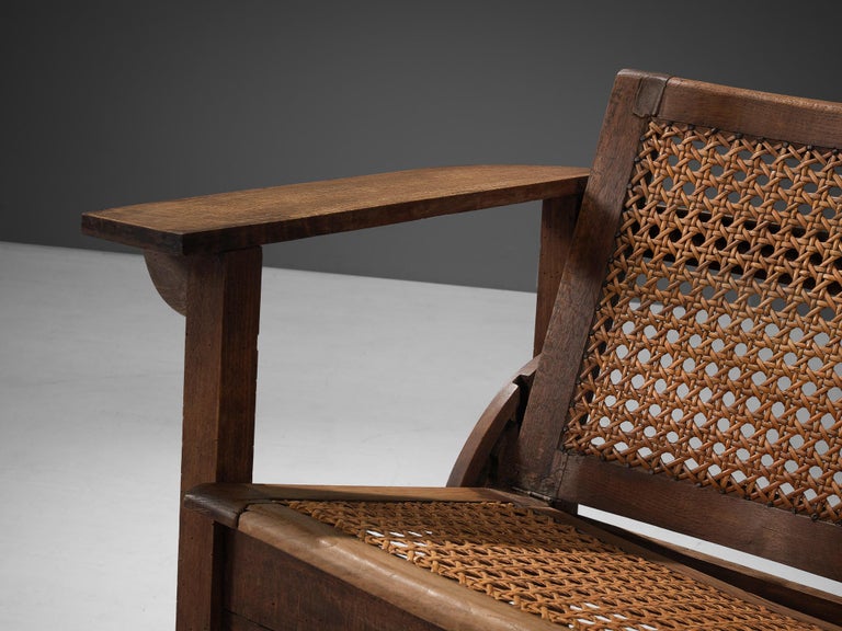 Pierre Dariel "Hendaye" Settee in Dark Stained Wood and Cane For Sale ...
