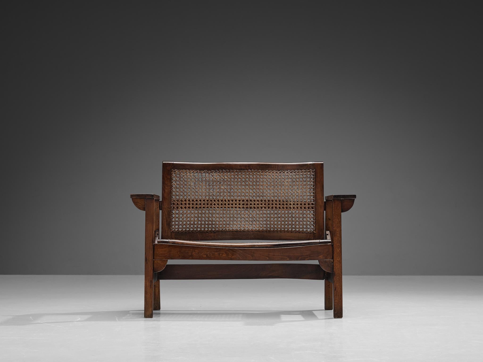 Pierre Dariel "Hendaye" Settees in Dark Stained Wood and Cane at 1stDibs