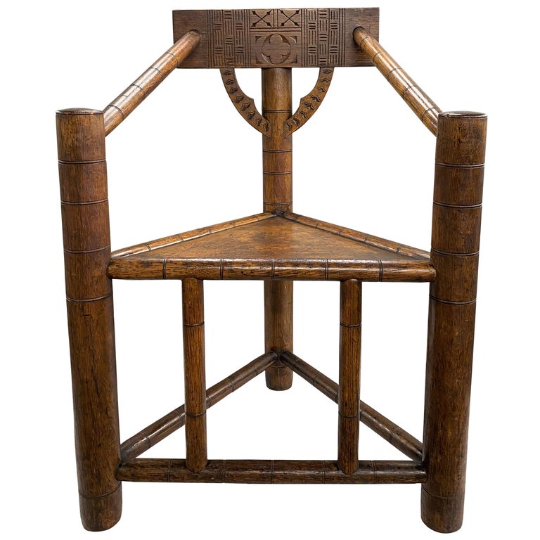 Pilgrim Century Style Carved Oak Turner's Corner Chair at 1stDibs