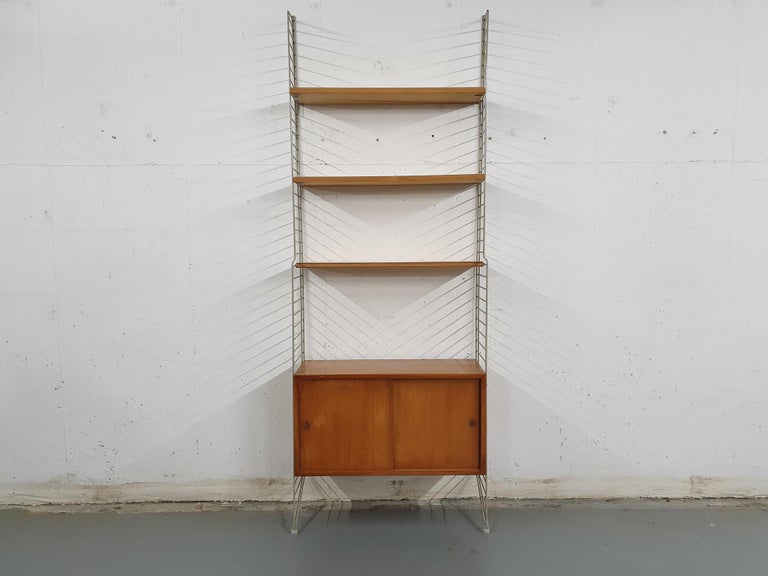 Pinewood wall unit by Nils “Nisse” Strinning for String, Sweden 1950's ...