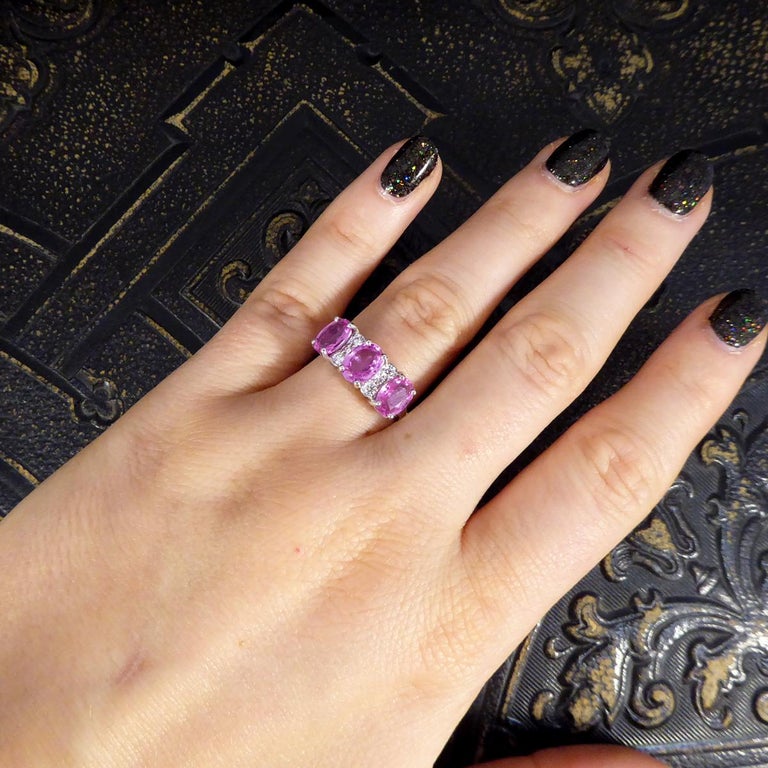 Pink Sapphire Three Stone Ring with Diamond Spacers in 18ct White Gold ...