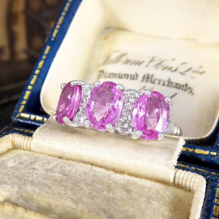 Pink Sapphire Three Stone Ring with Diamond Spacers in 18ct White Gold ...