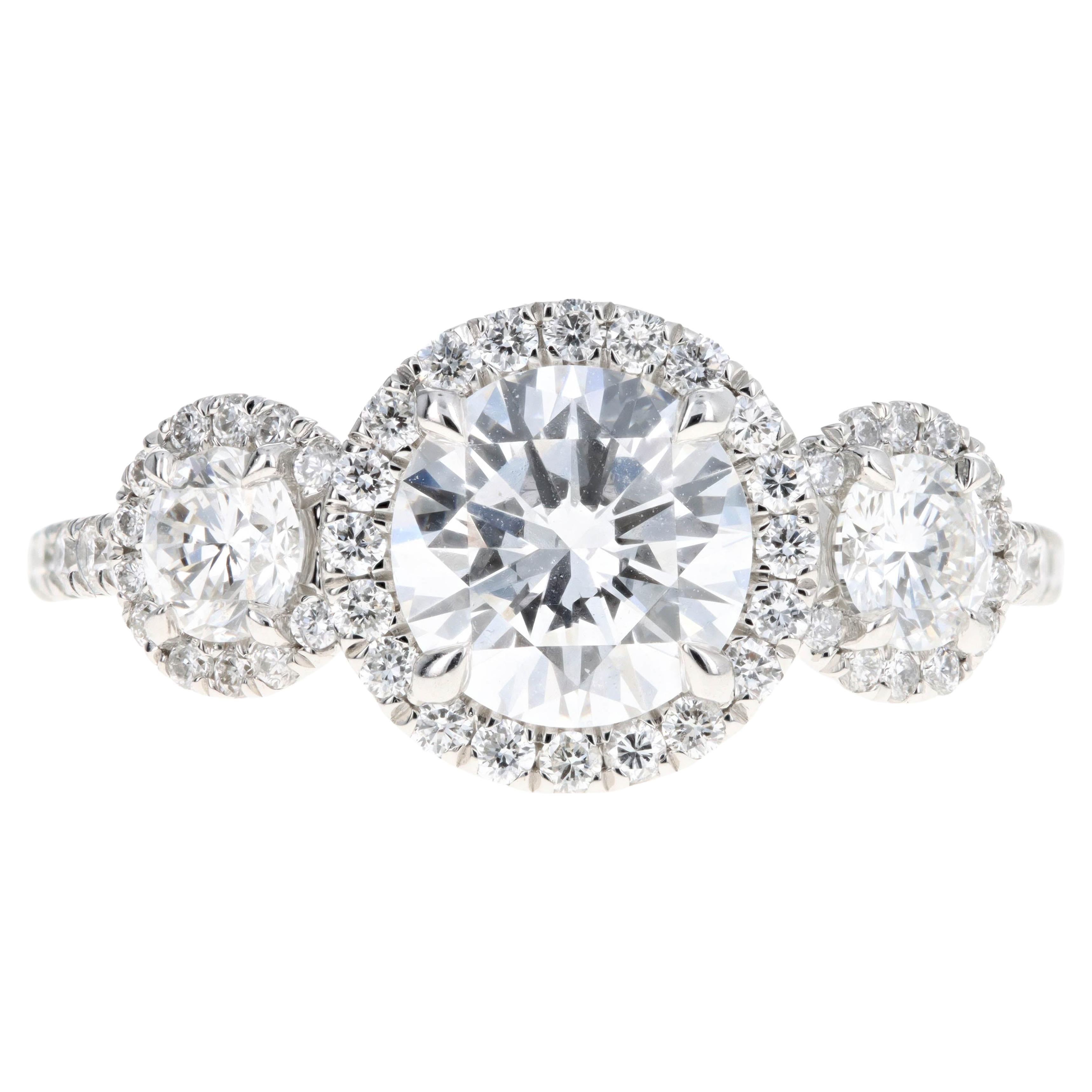 Three Stone Round Brilliant Ring at 1stDibs