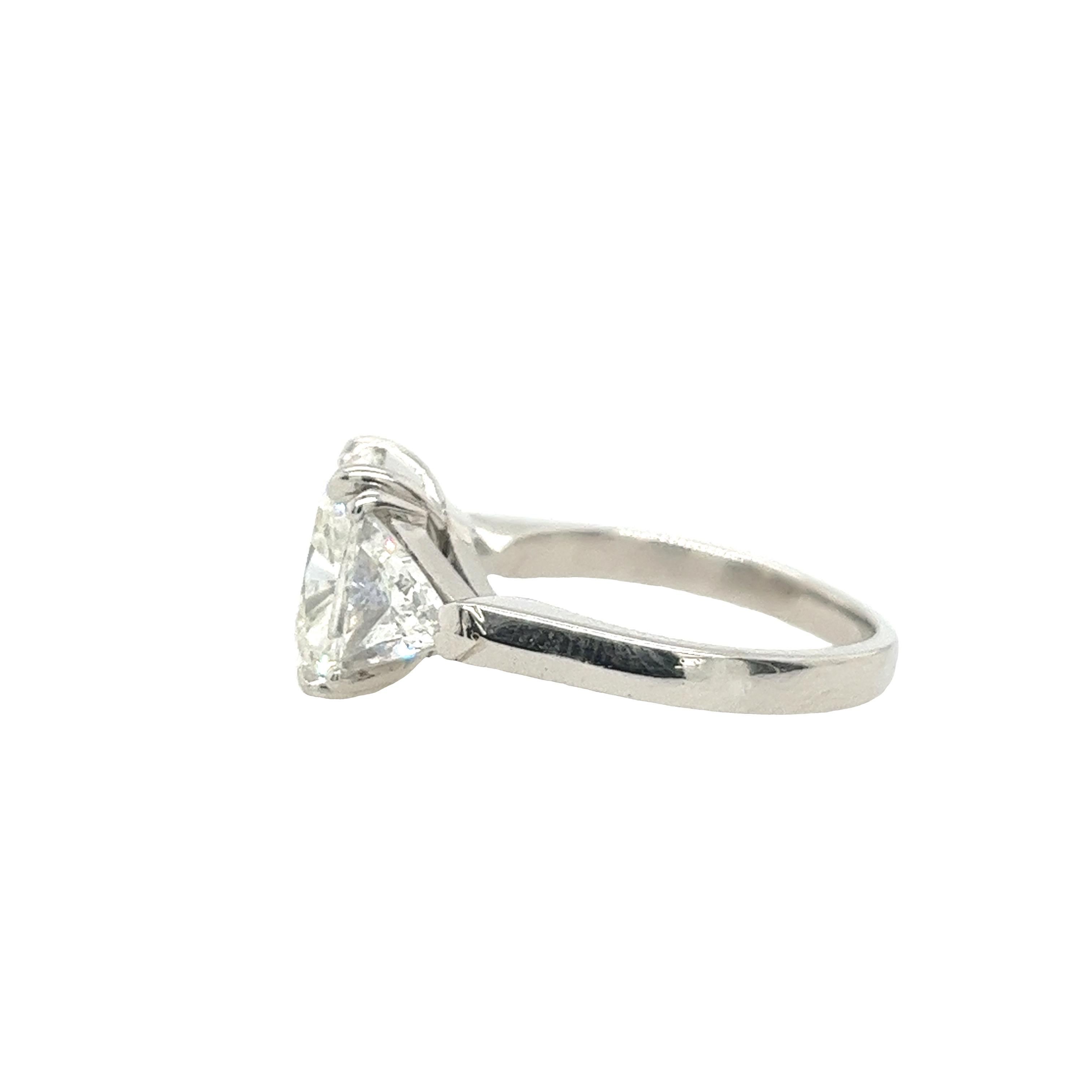 Platinum 3.14ct I/VS1 Modified Brilliant Diamond Ring and 1.60ct Triangle Diamonds For Sale at ...