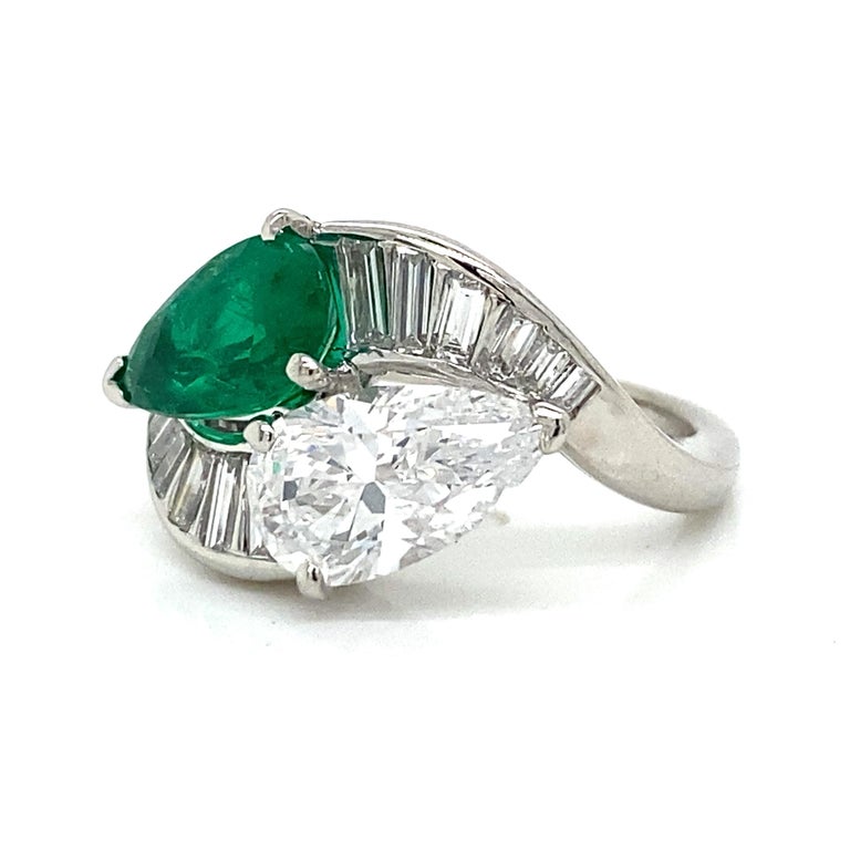 Platinum Emerald and Diamond Bypass Ring For Sale at 1stDibs