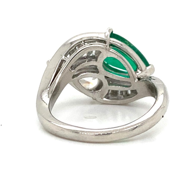 Platinum Emerald and Diamond Bypass Ring For Sale at 1stDibs