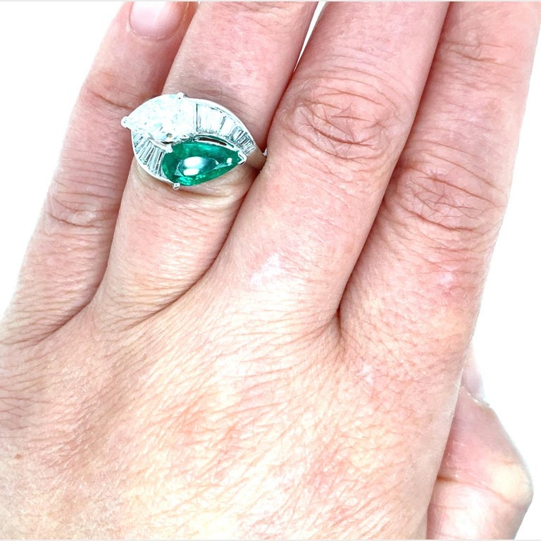 Platinum Emerald and Diamond Bypass Ring For Sale at 1stDibs
