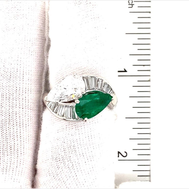 Platinum Emerald and Diamond Bypass Ring For Sale at 1stDibs